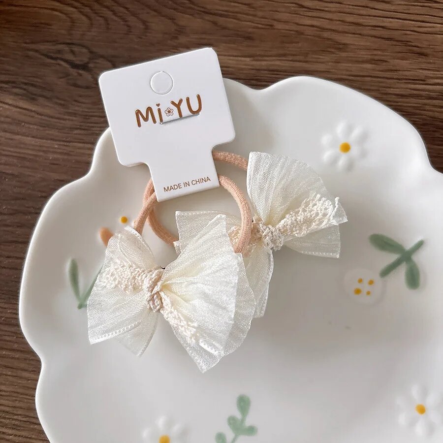 Детские кружевные бантики beige 6