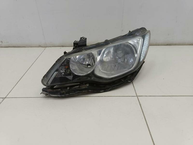 Фара левая Honda Civic 4D 2006-2012 кат.номер: 33151SNBG03