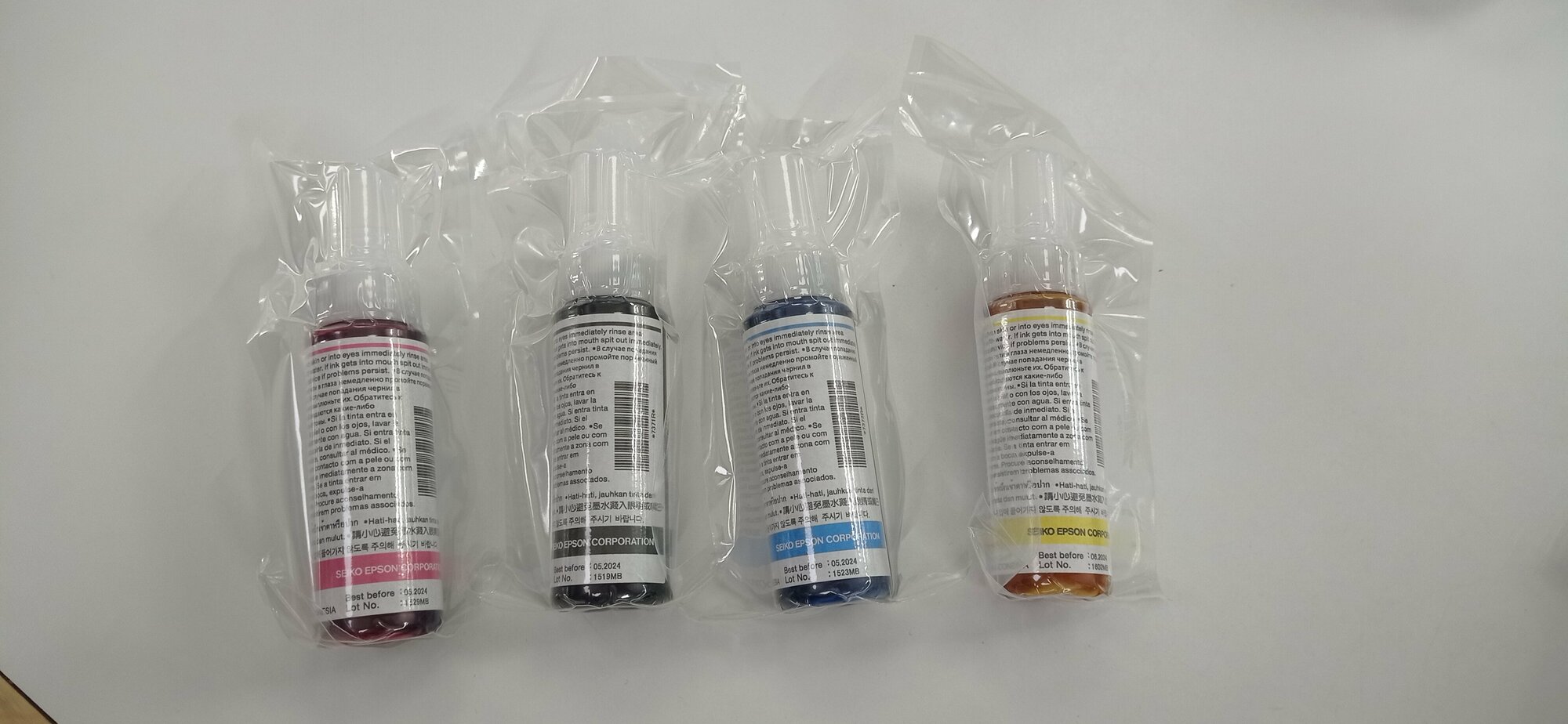 Чернила для принтеров Epson L100, 4 цвета, 4х40 мл, блистер, оригинальные, 2024 года на флаконе