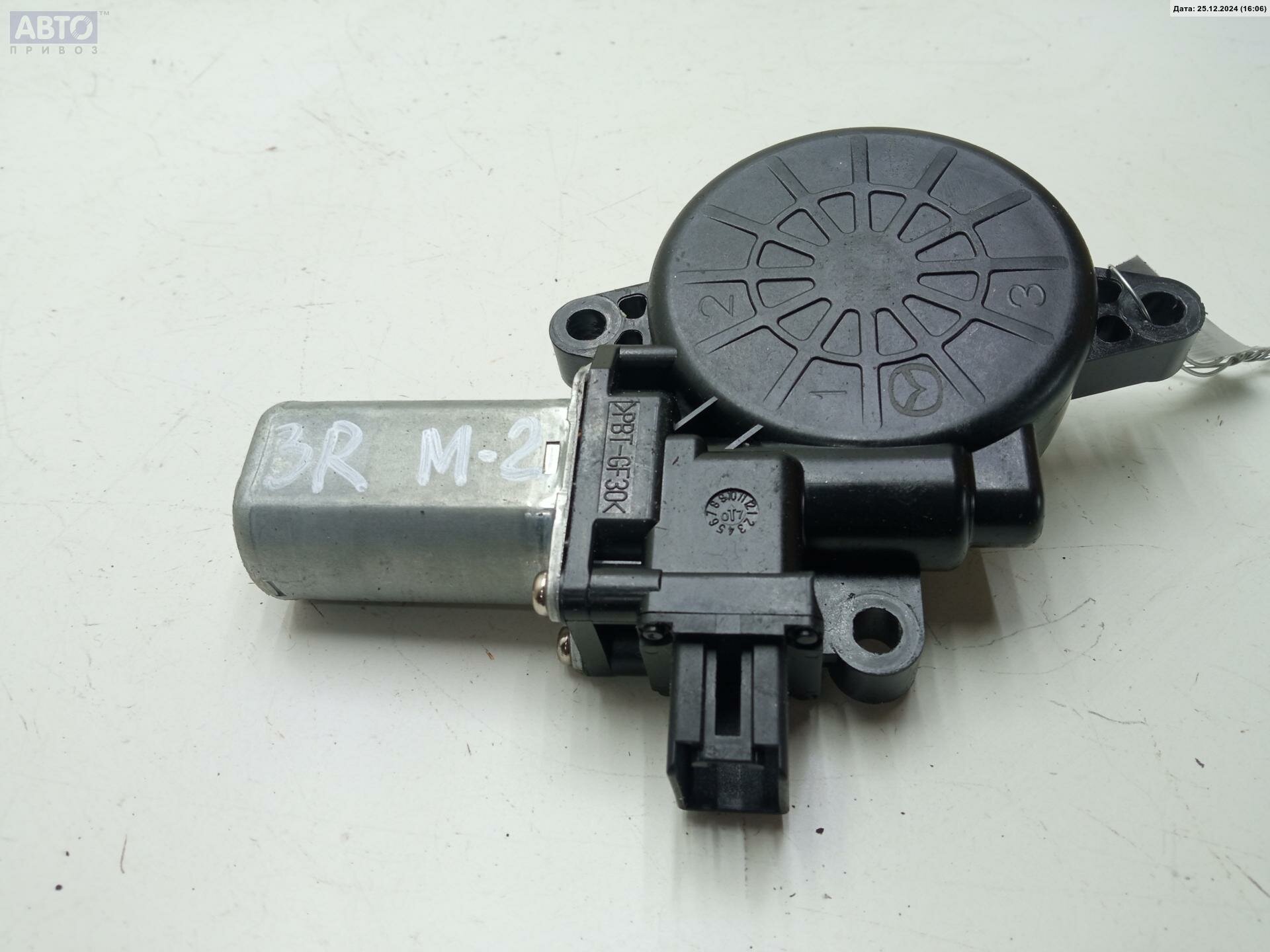 Моторчик стеклоподъемника задний правый Mazda 2