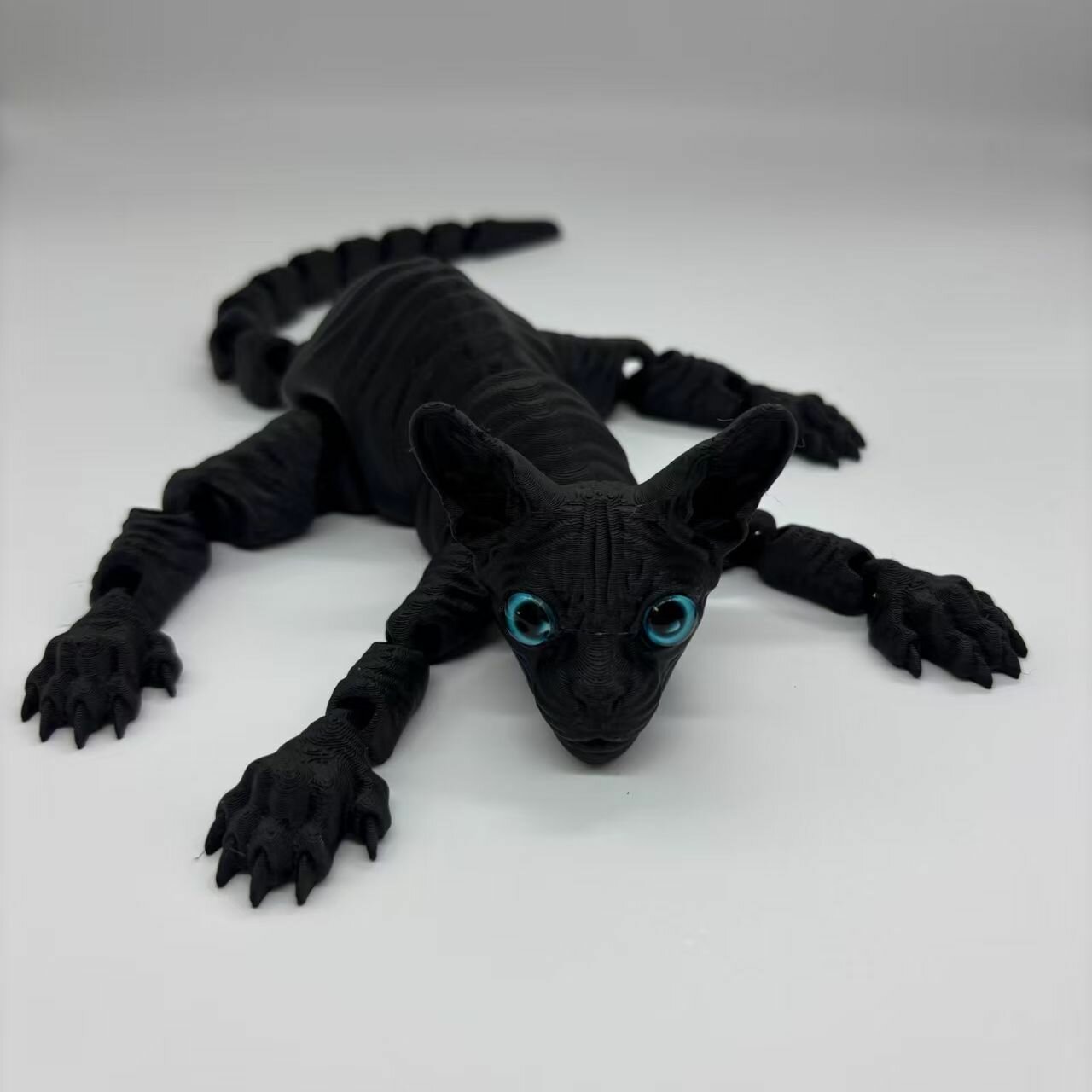 3D игрушка кот Сфинкс подвижная фигурка с зелеными глазами1 шт