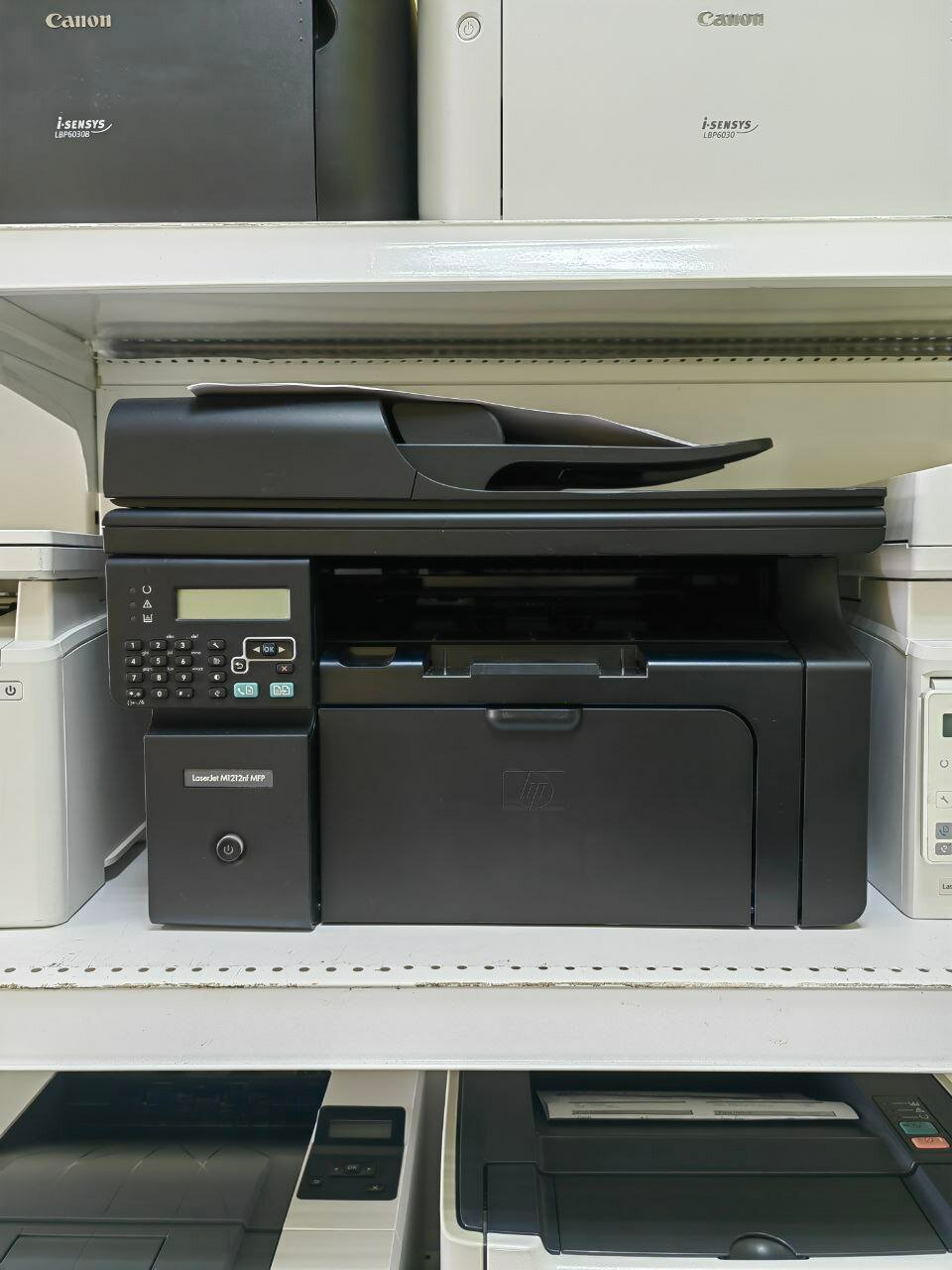 Мфу лазерное HP LaserJet Pro M1212nf для офиса и дома, с автоподатчиком, сетевое