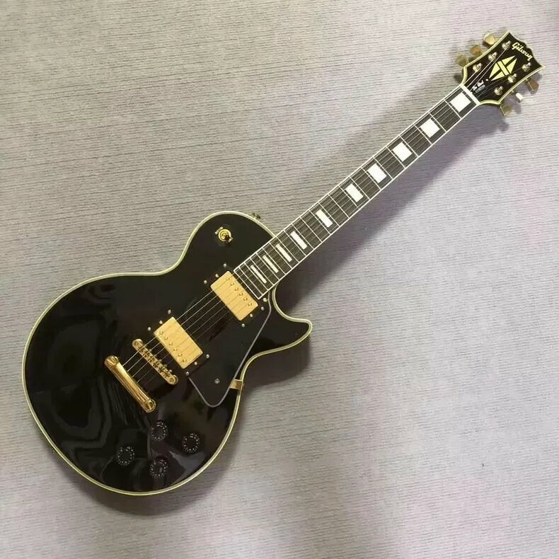 Gibson Guitar Электрогитара Gibson Les Paul 6-струнная, корпус Махагони 39"
