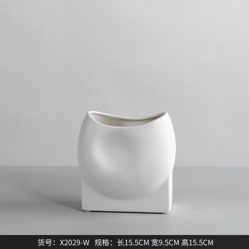 Простой скандинавский керамический вазон в стиле Моренди для декорации.