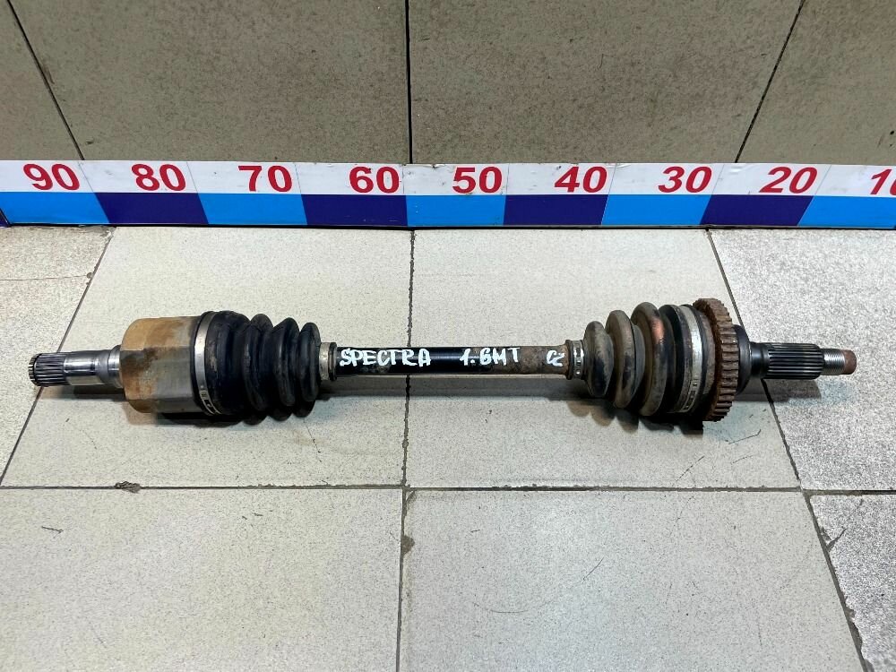 Полуось передняя левая Kia Spectra