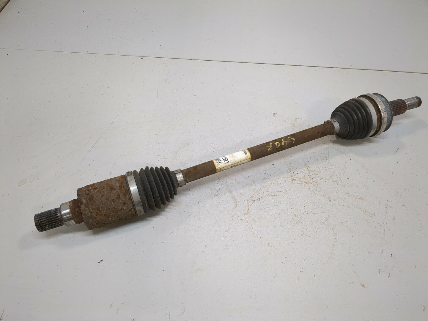 Полуось (вал, шрус) левая задняя Ford Escape Б/У