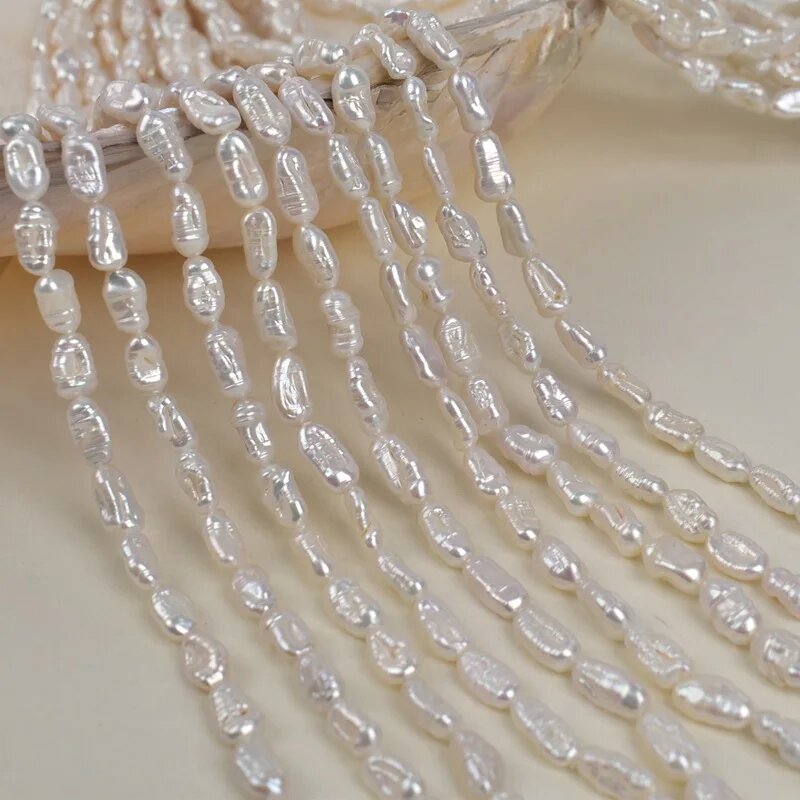 Белый натуральный пресноводный жемчуг Pipa 6x10 мм 36 см