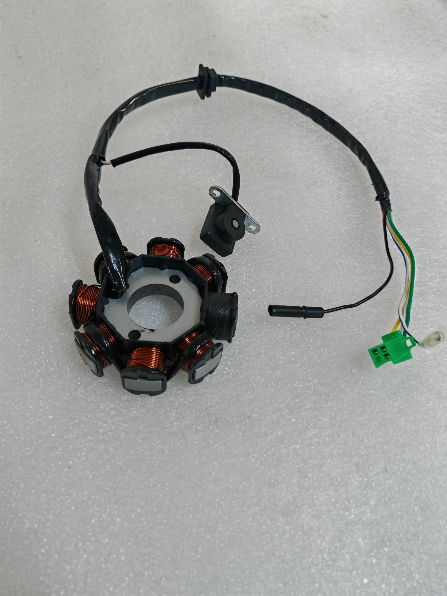 Статор генератора на китайский скутер GY-6 125 / 150 кубов / 152QMI / 157QMJ