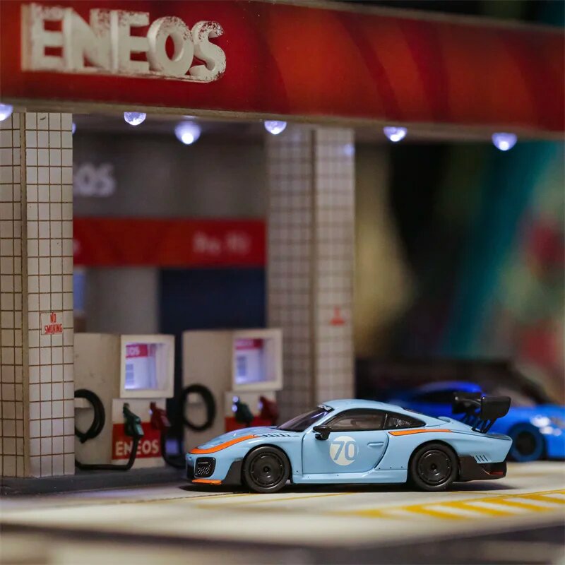Модель автомобиля Porsche 918 Spyder 1:64, цвет MINICHAMPS Blue