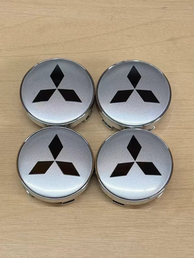 Переоборудование автомобиля Колпачки заглушки на литые диски Mitsubishi 60/56/10 мм, комплект 4 шт. На диск Мицубиси влезут.
