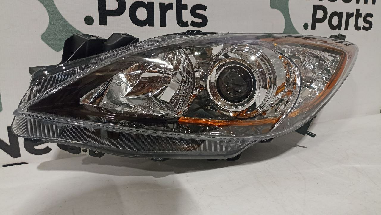Фара левая галоген Mazda 3 BL 09-13