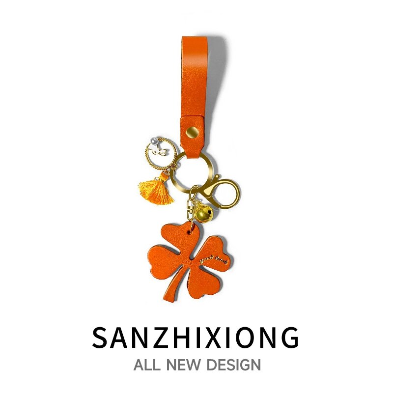 Брелок для ключей из натуральной кожи в виде четырехлистного клевера для женщин, креативный брелок-подвеска для ключей