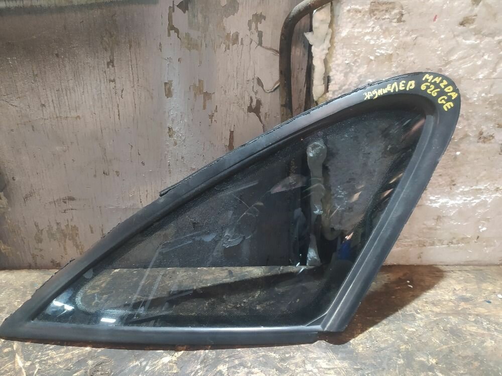 Стекло кузовное глухое левое Mazda 626 GE (1991 1997) Б/У с пробегом