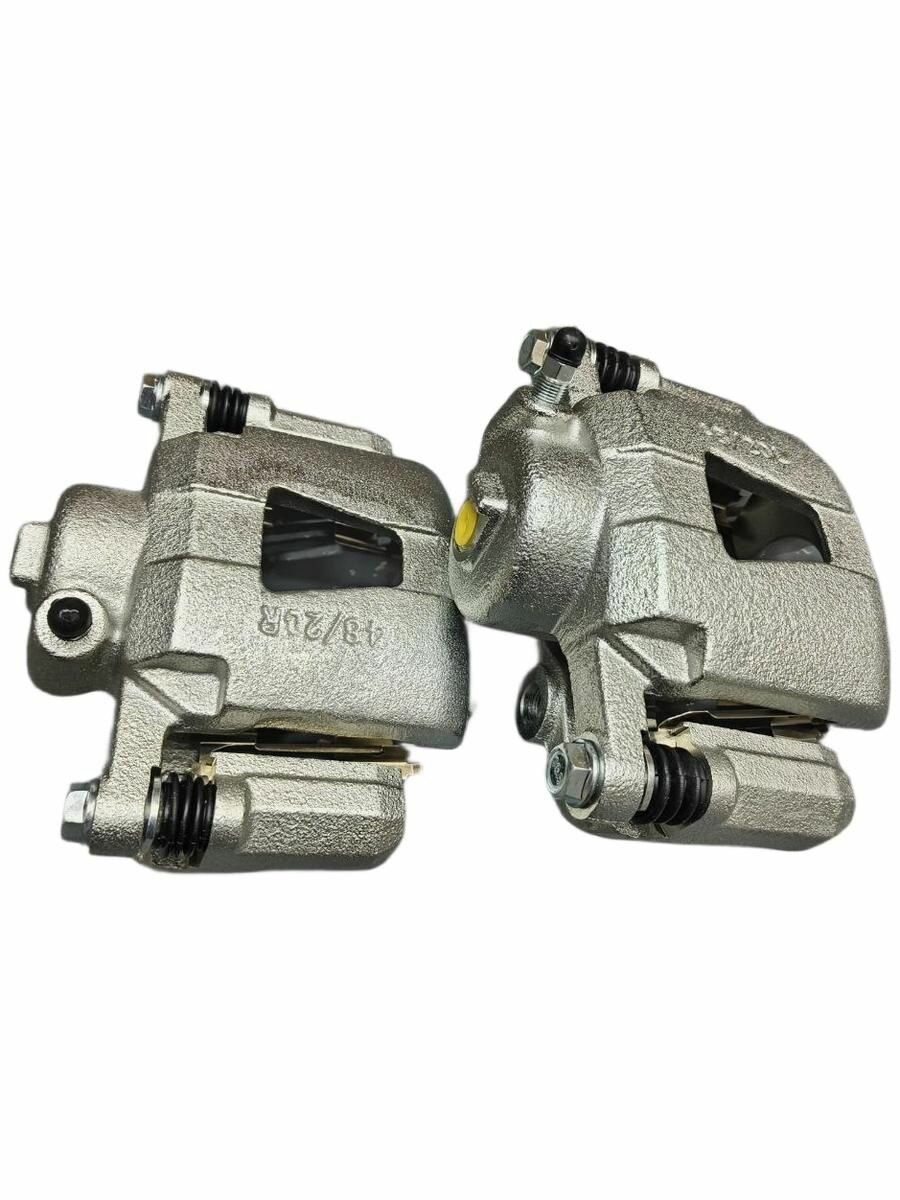 Тормозной суппорт в сборе (комплект)левый и правый на Daewoo Nexia SOHC Weismo (R13)