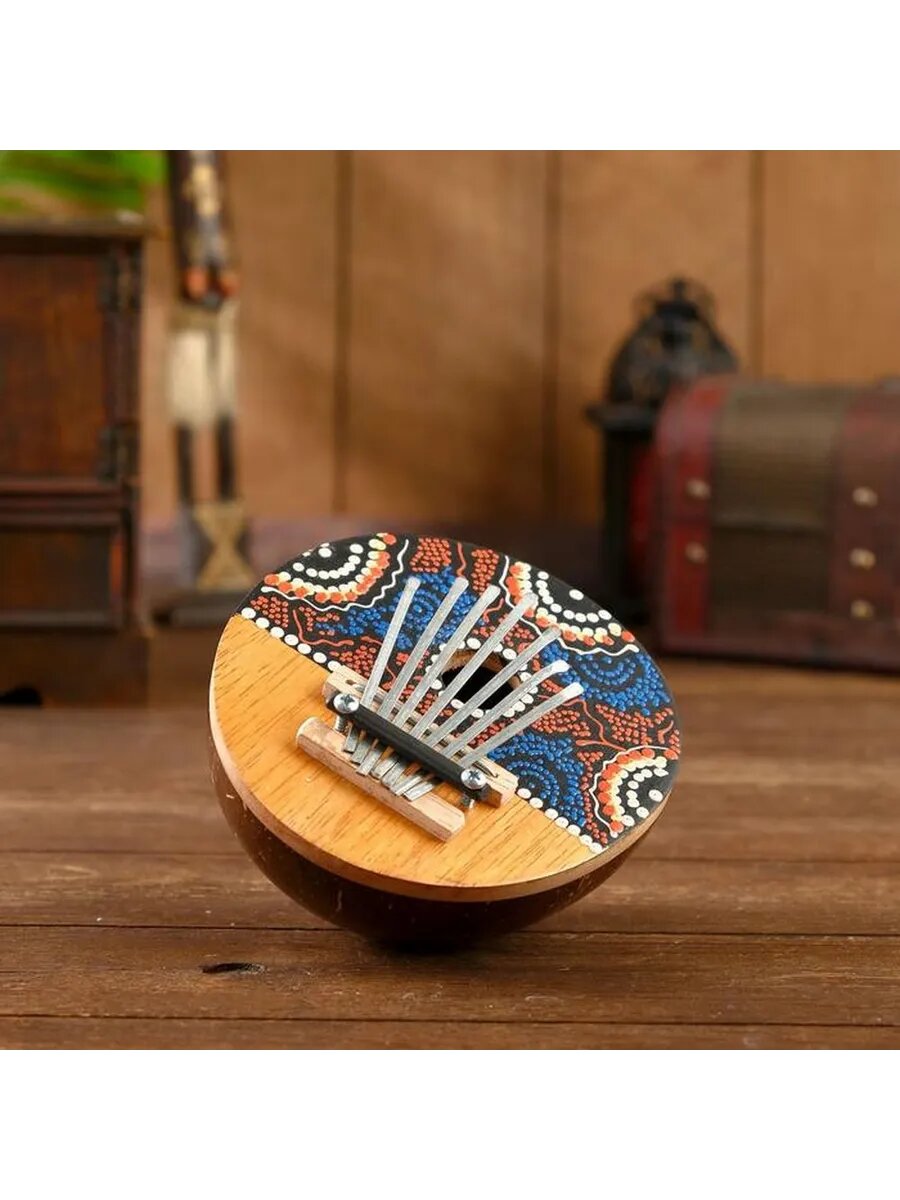 Яркая круглая калимба с уникальным дизайном