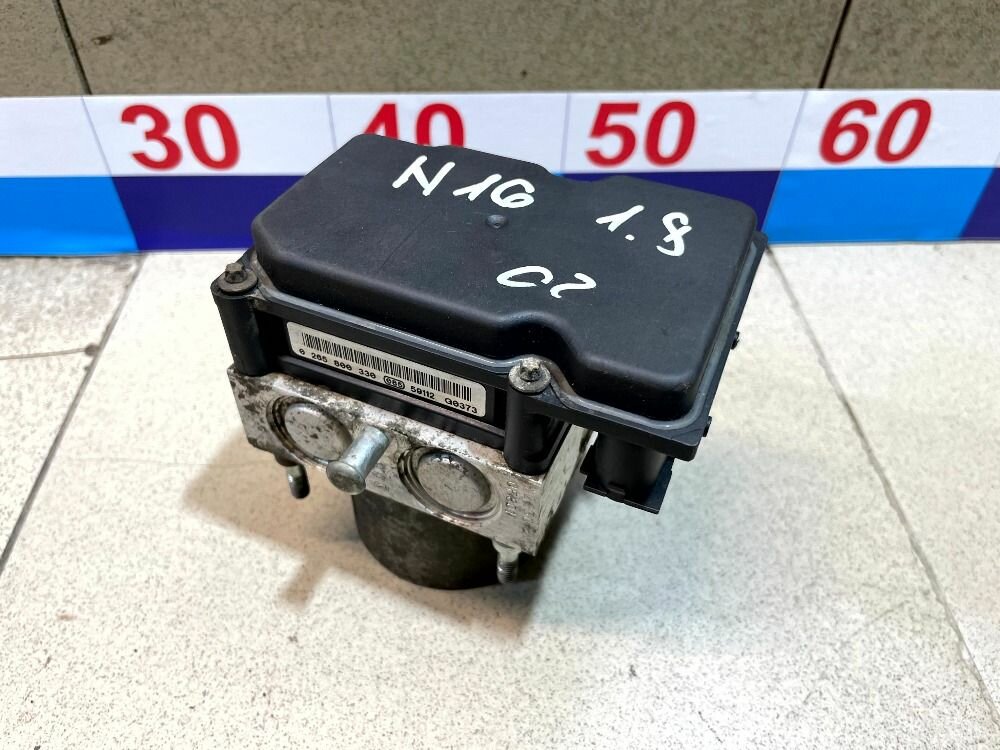 Блок abs (насос) Nissan Almera N16