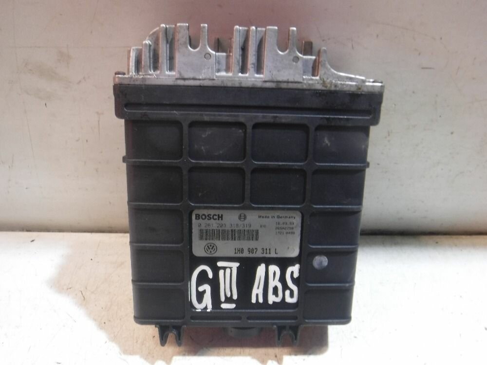 Блок управления двигателем VW Golf III 1H0907311L