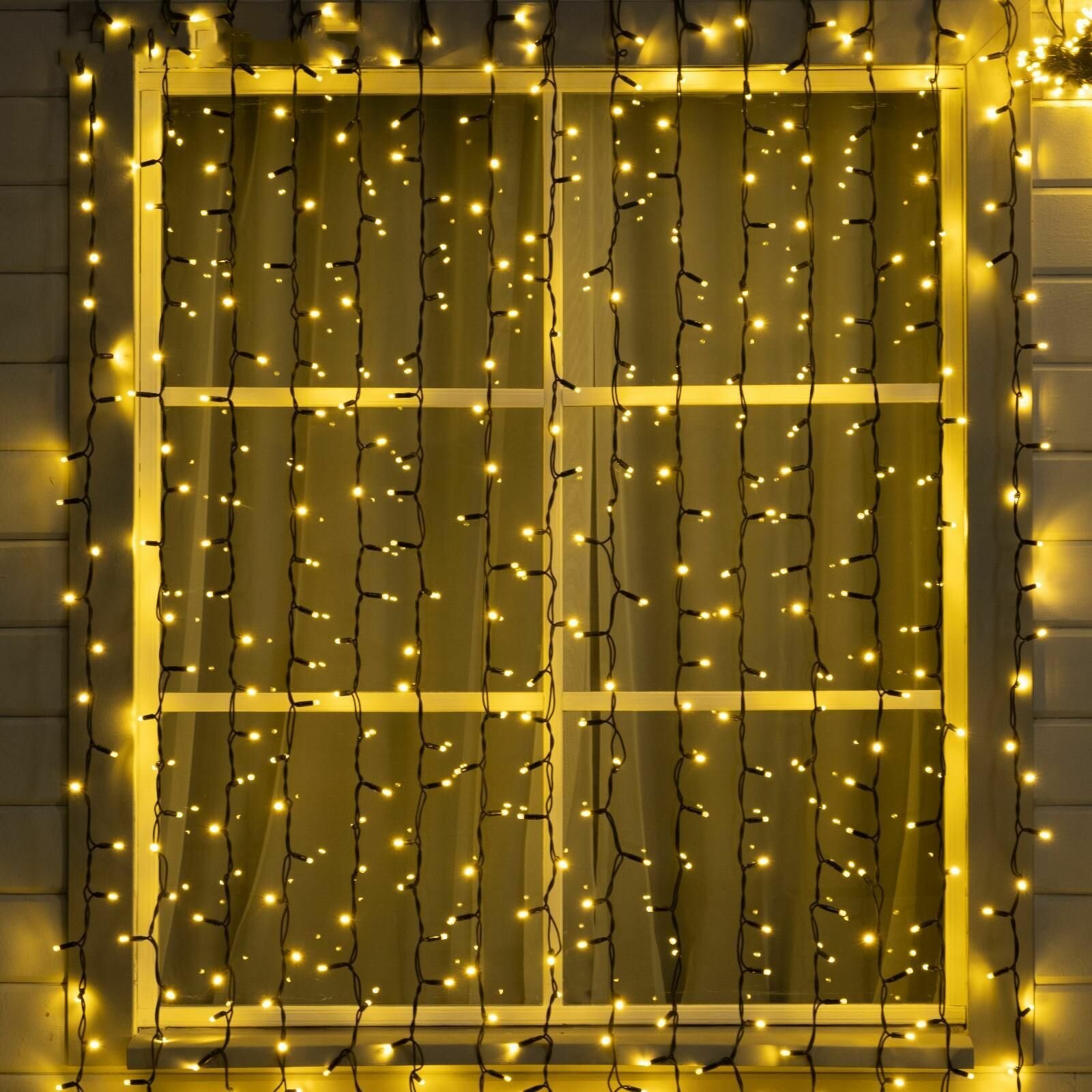 Гирлянда уличная Занавес , светодиодная электроГирлянда уличная дождь на окна и фасад, 2 х 3 м, IP65, УМС, тёмная нить каучук, 600 LED свечение тёплое белое, 220 В