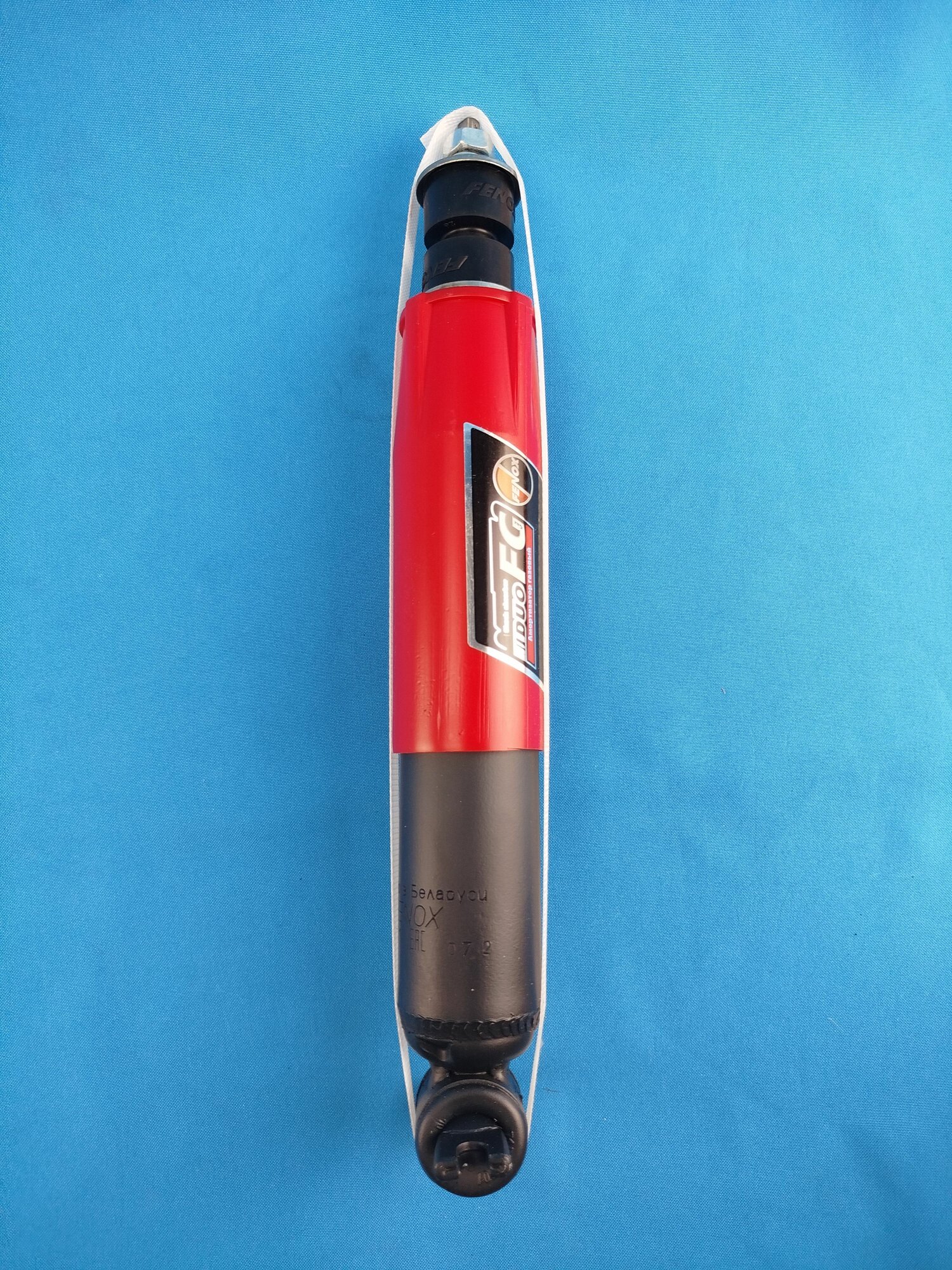 Амортизатор передний "FENOX" для а/м Волга газовый (пласт. кожух)