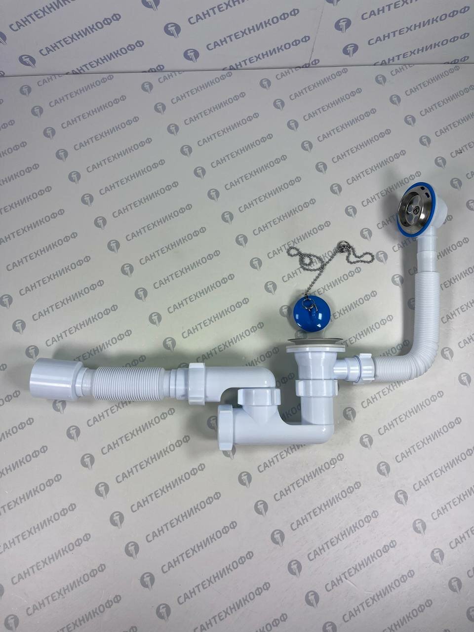 Сифон АНИ пласт для ванны регулируемый с выпуском 1 1/2"*40, с переливом, с гибкой трубой (Е255)