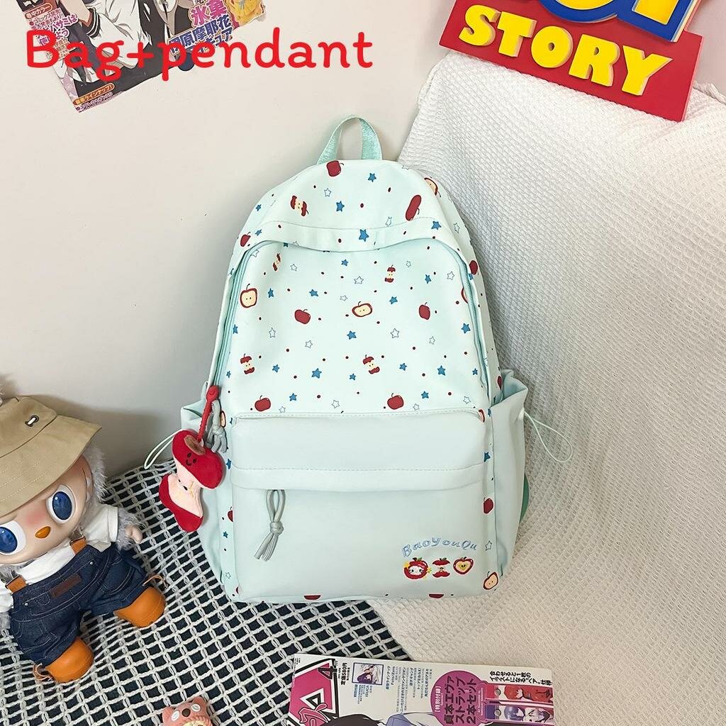 Girls campus backpack with padded shoulder system and star pattern for school and daily use, green