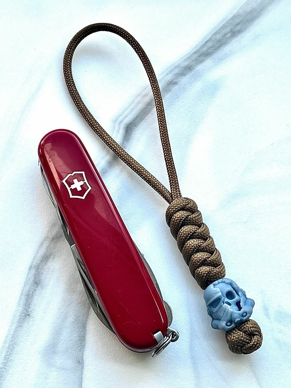 Темляк брелок для ножа из паракорда с пластиковой бусиной "Пехотинец империи"