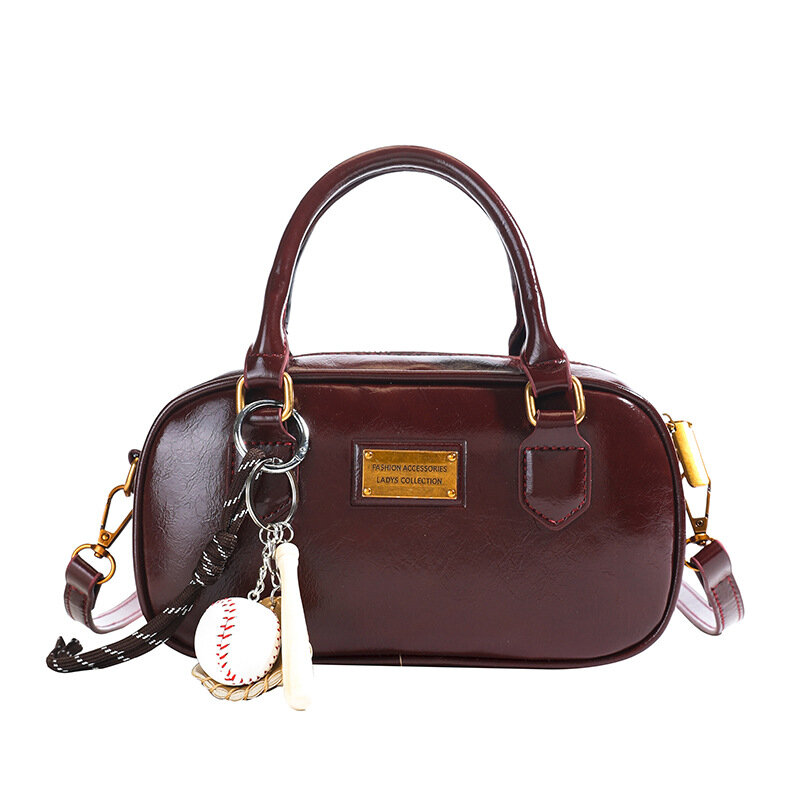 2026 Корейская версия сумки для боулинга 2025 Модная сумка Boston для женщин Ретро маленькая квадратная сумка Европейский и американский стиль Сумка через плечо