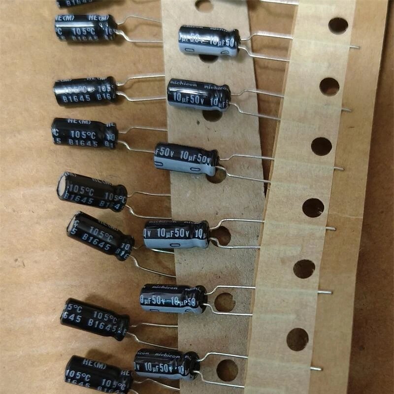 Конденсаторы Nichicon 50V10UF 50В 10мкФ чёрные 5X11MM 100шт
