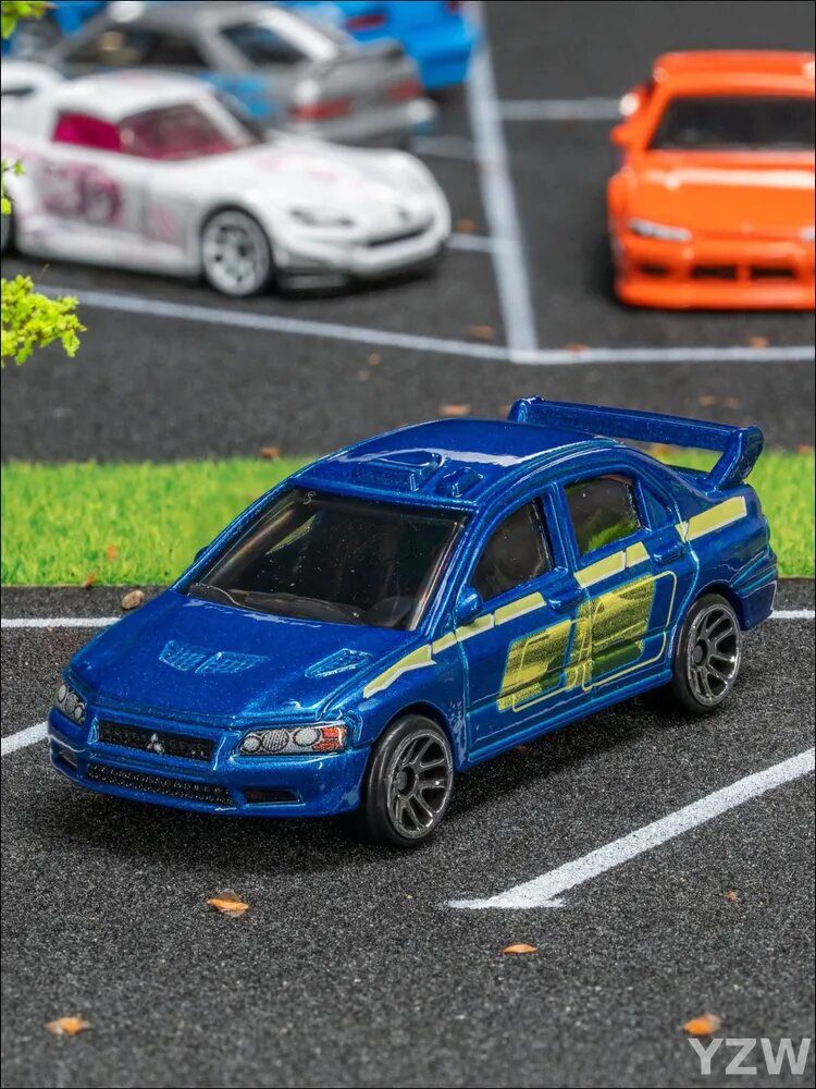 Игрушечная машинка Hot Wheels Lancer Evolution VII Fast & Furious: Graphic Remix 1/64 Металл Синий — фото 1