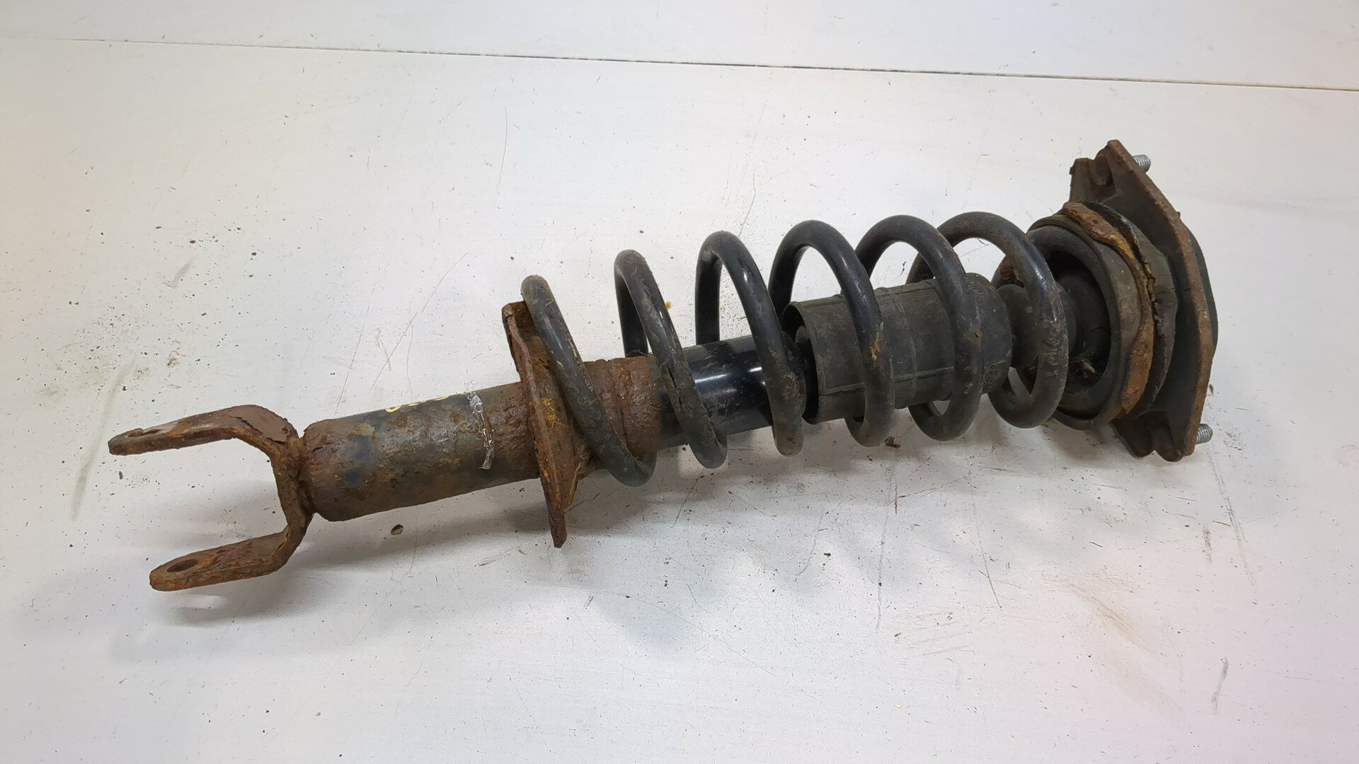 Амортизатор подвески левый задний Subaru Tribeca (B9) Б/У