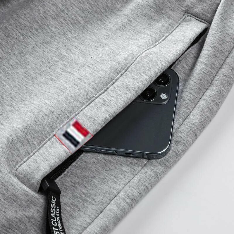 Мужские спортивные шорты, серые, сdrawstring и карманами на молнии, для отдыха и спорта — фото 1
