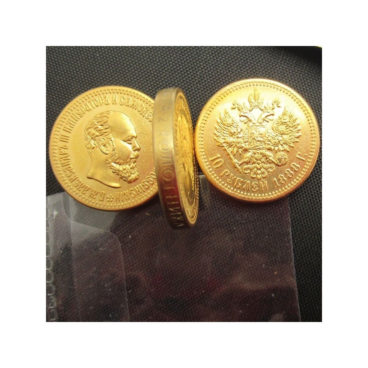 Позолоченные памятные монеты номиналом 10 рублей (1886-1894 гг.) в 9 моделях.