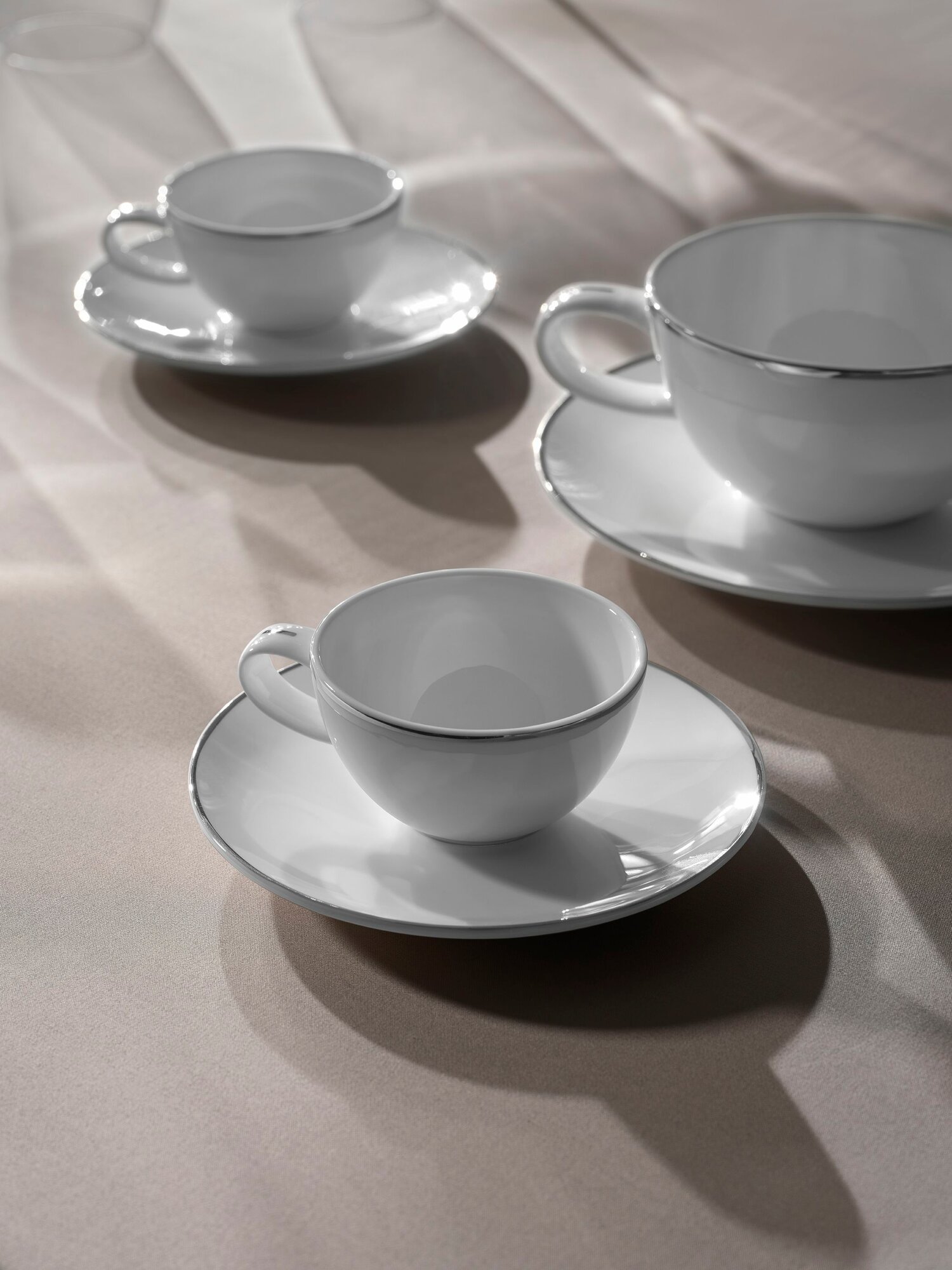 Togas Кофейная пара - чашка с блюдцем для эспрессо "Канни" фарфор, серебро, 100 мл