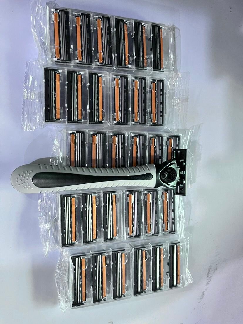 Станок для бритья мужской и женский Evolux 31. Набор: Бритва для мужчин и женщин + 31 кассет в комплекте