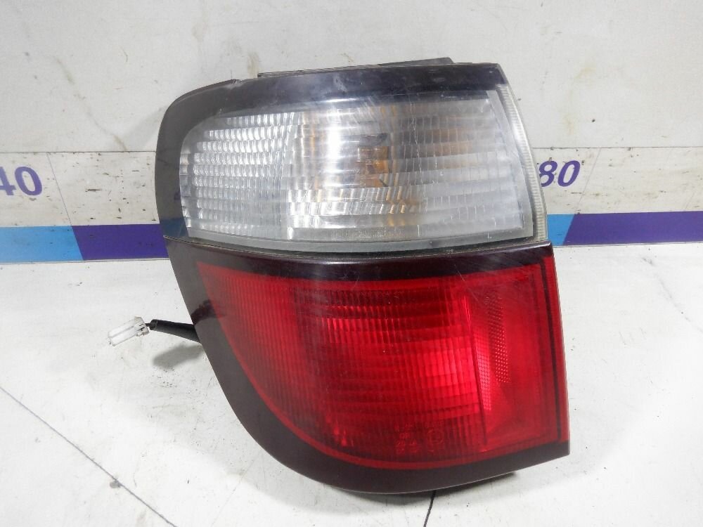 Фонарь задний левый Mazda 626 FS GF3H51160D