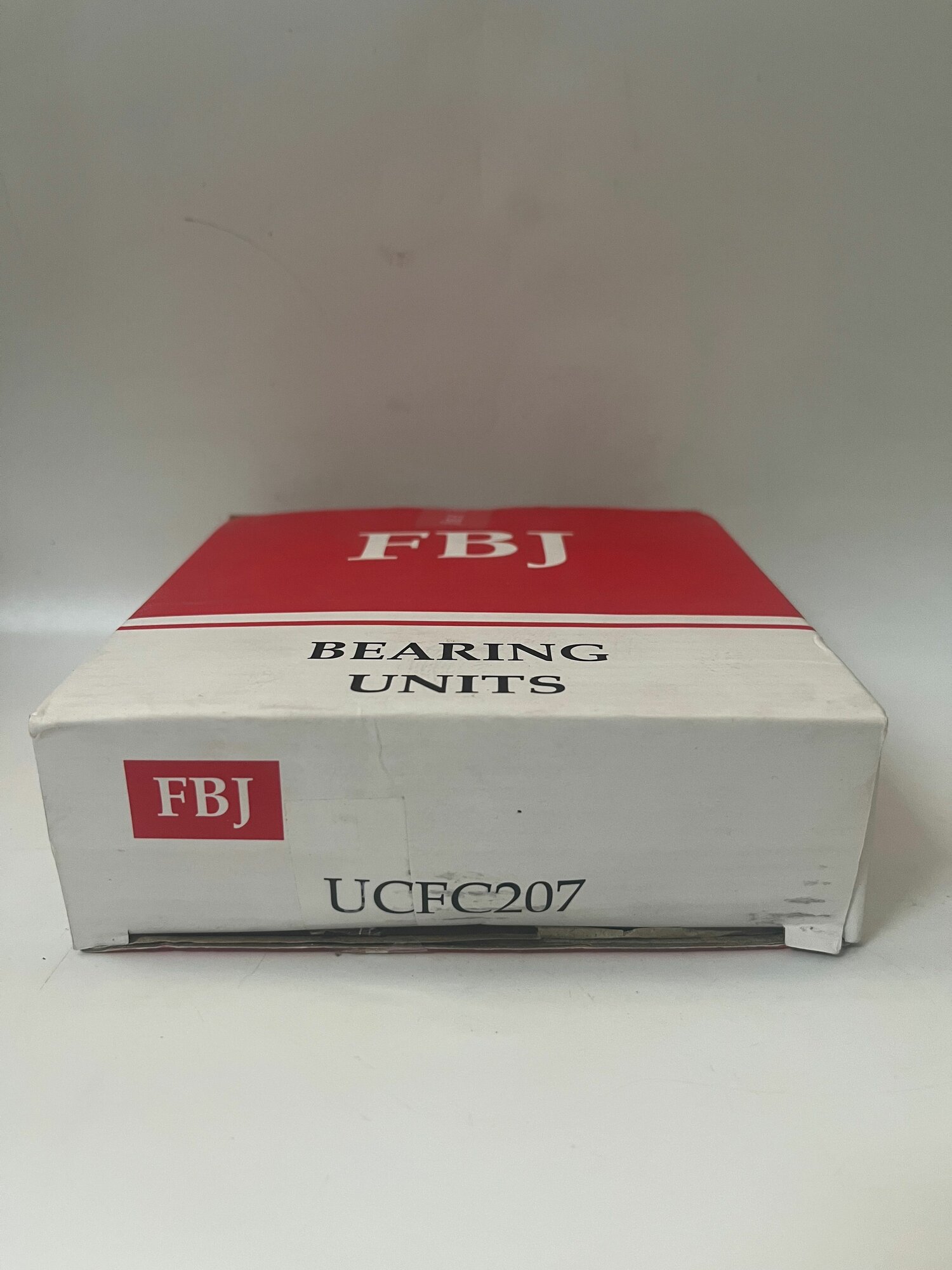 Подшипниковый узел UCFC207 диаметр 35мм FBJ