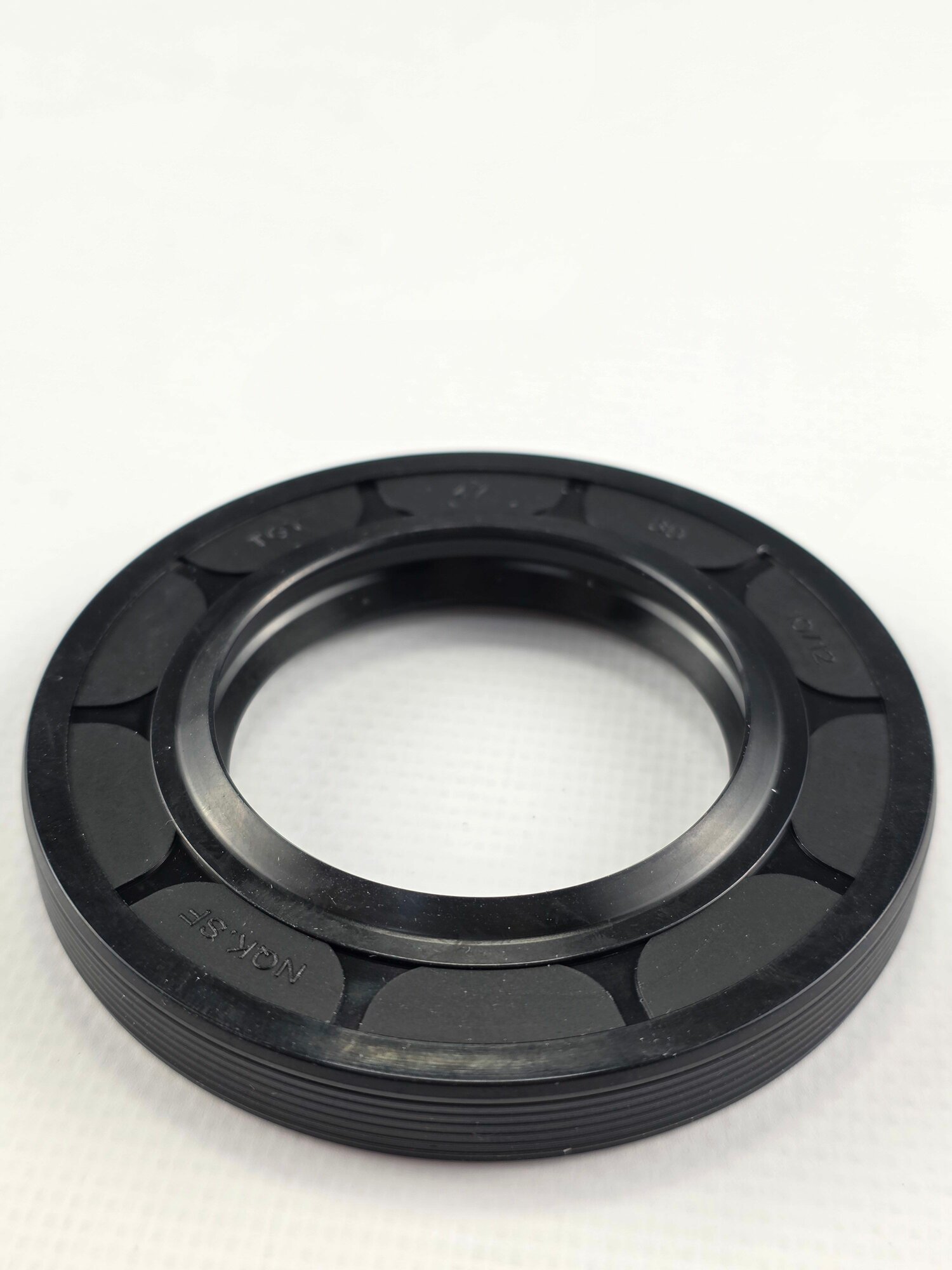 Сальник 47х80х10/12 BOSCH / SIEMENS / AEG (613084 / 03AT118)