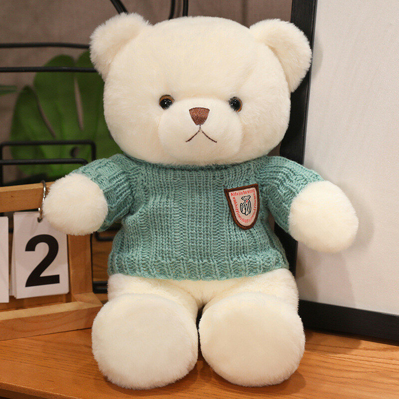 Teddy bear cute stuffed animal wearing sweater design for children