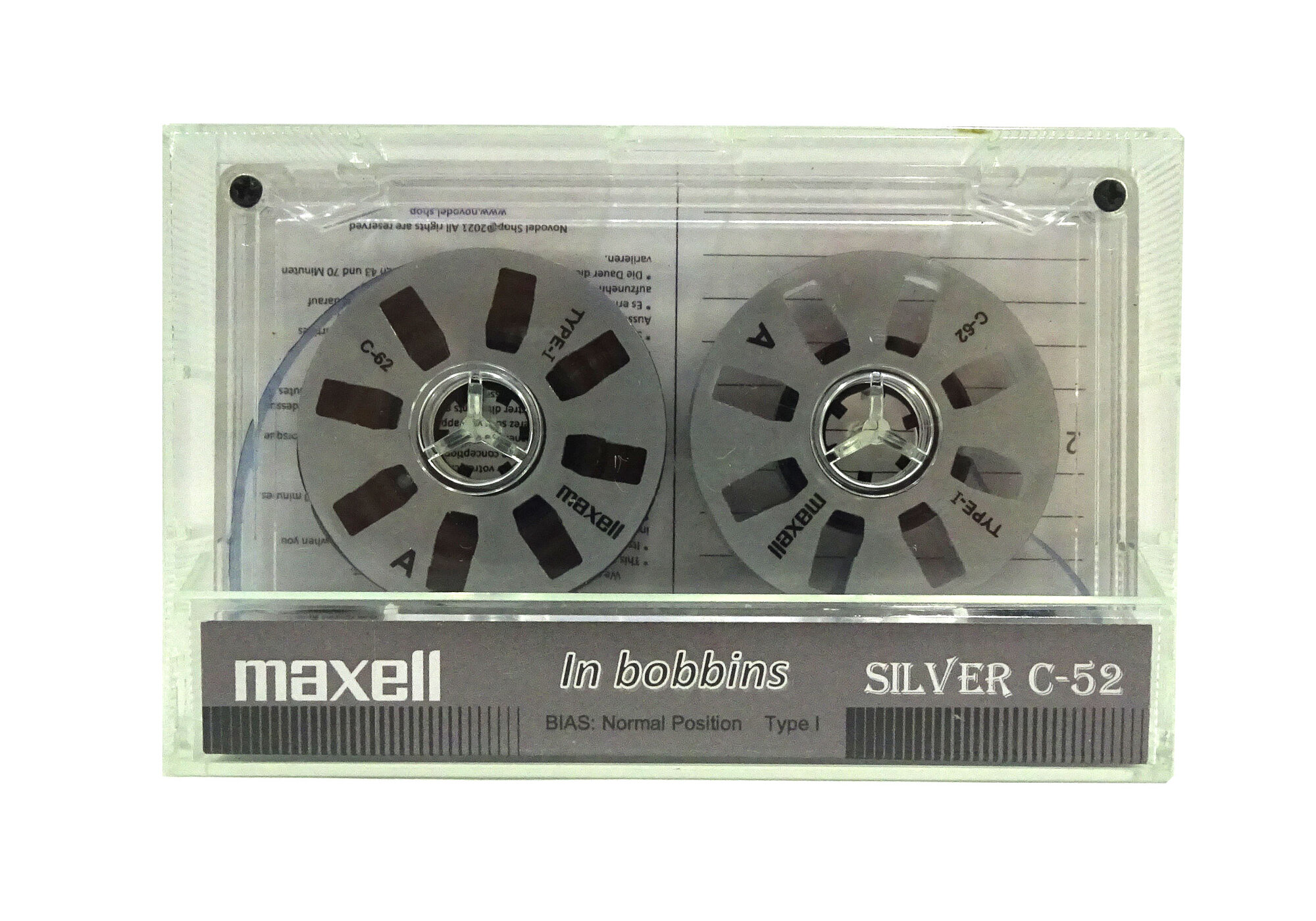 Аудиокассета "MAXELL" с cеребристыми катушками 8 отверстиями