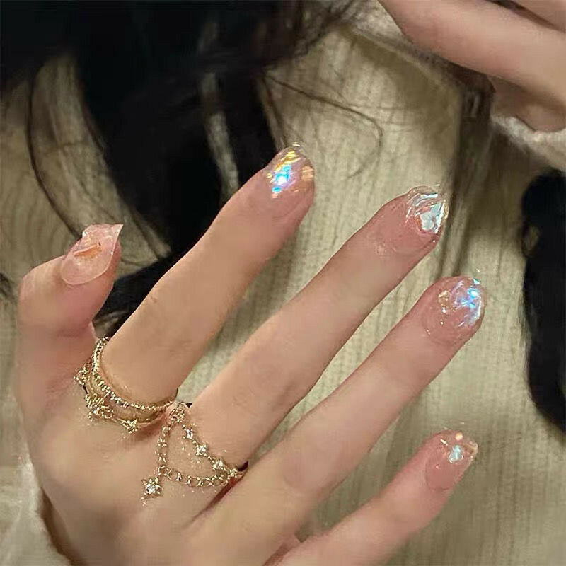 Nail art handcrafted warm elf, flashing aurora rhinestones, starry sky pattern