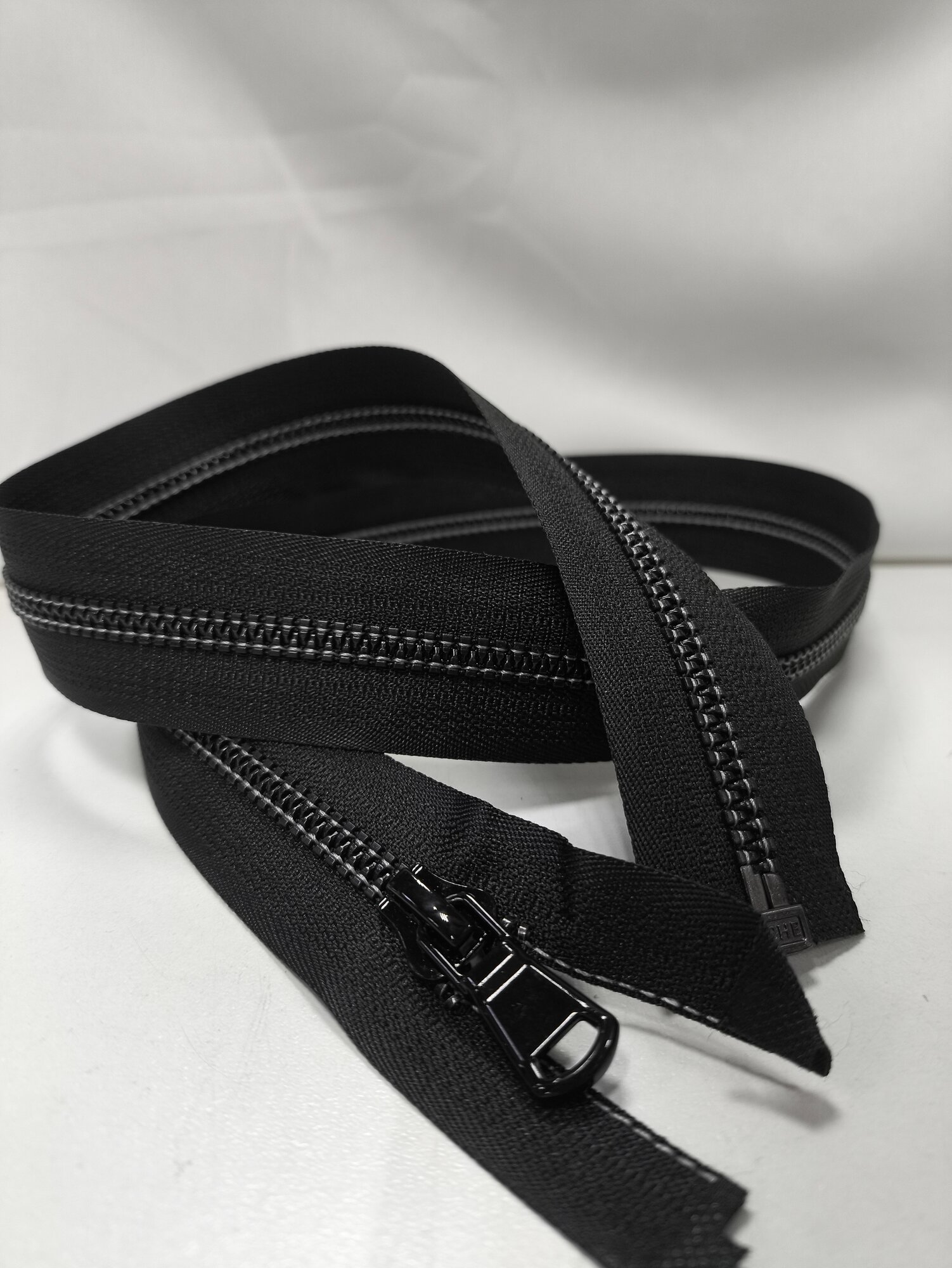 Молния трактор тип 5 80см с декоративным бегунком разъемная однозамковая с прошитыми звеньями (белый)