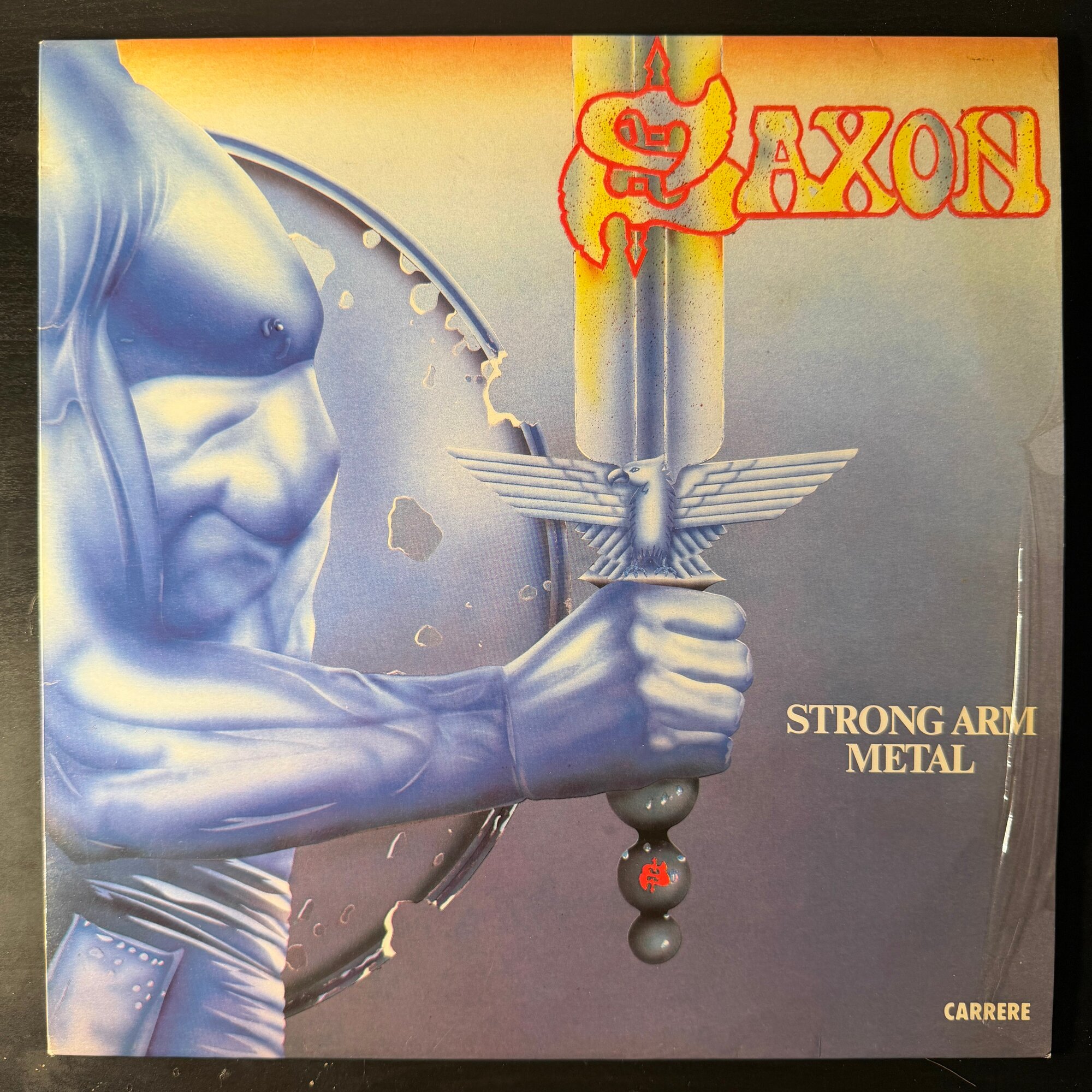 Виниловая пластинка Saxon Strong Arm Metal (Франция 1984г.)