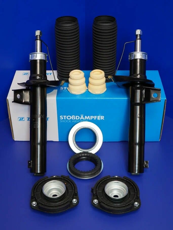 Пара передних амортизаторов с пыльниками, отбойниками, опорами и подшипниками опор Джетта 5,6 05-18г