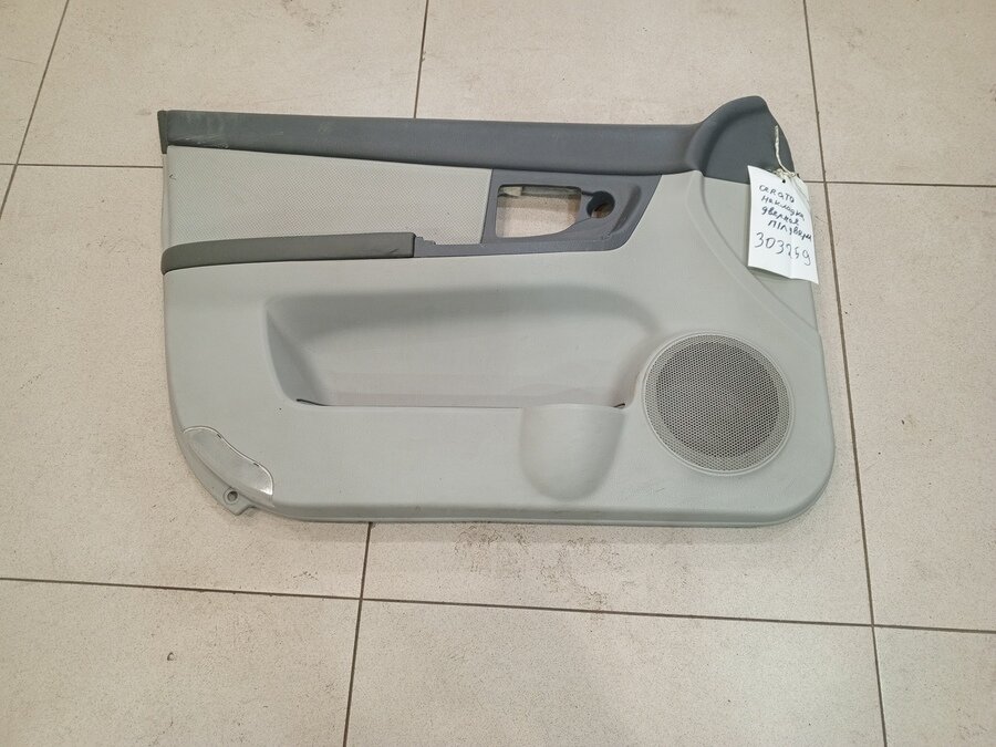 Обшивка двери передней левой от Kia Cerato 2004-2008