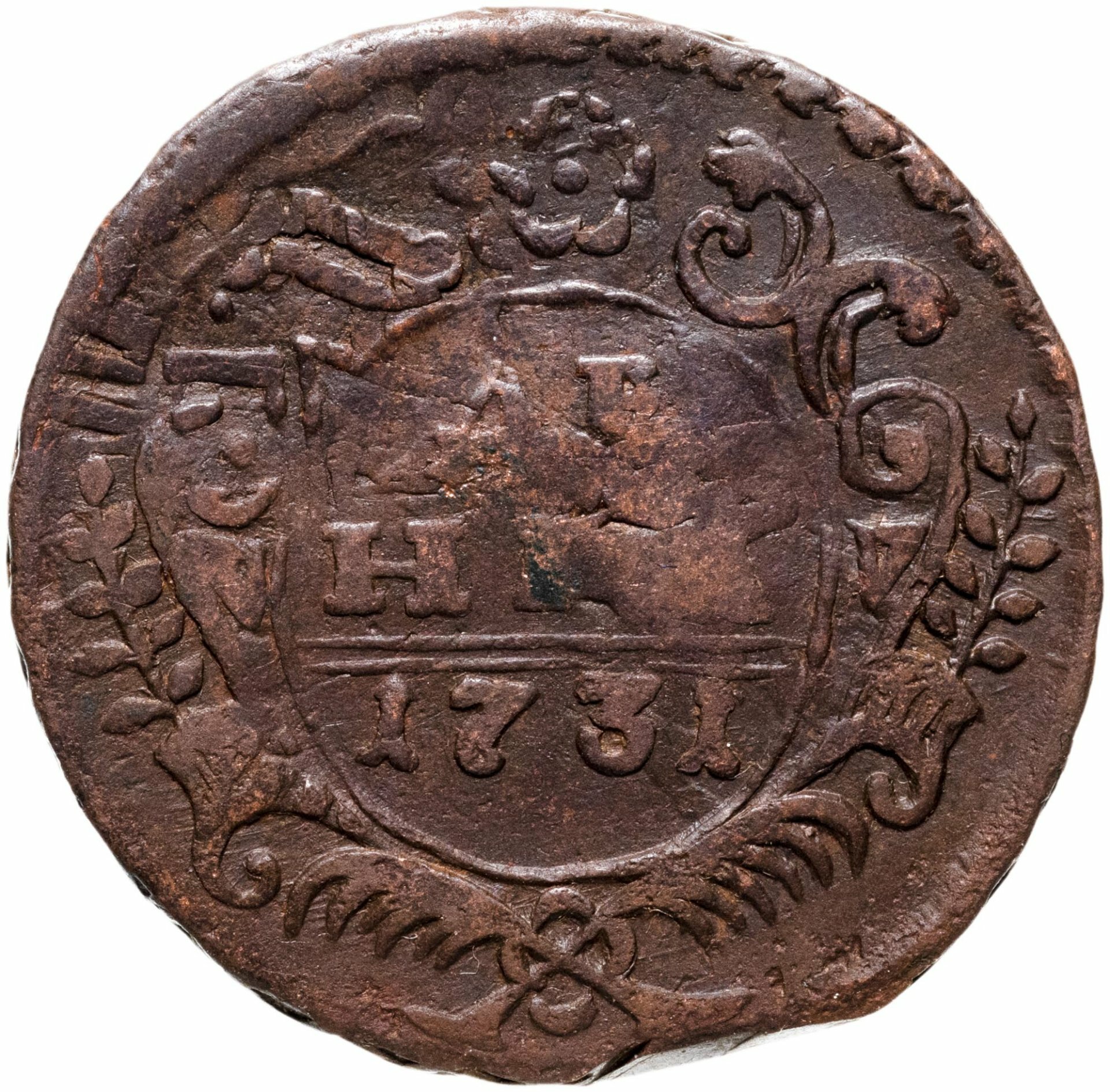 Денга 1731 над годом две черты, перечекан из копейки Петра I, Медь, в сохранности VF