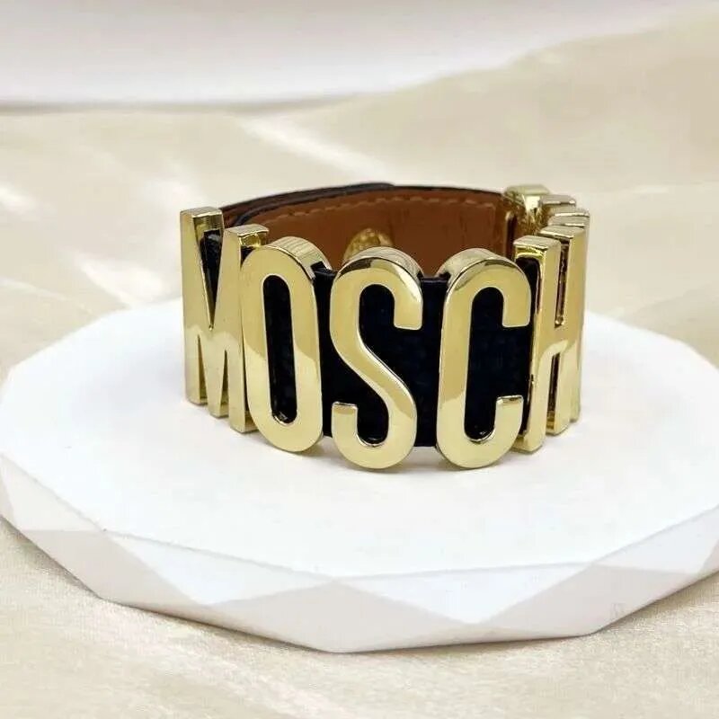 Moschino Женский браслет бэнгл с надписью MOSCHINO золотистого цвета из кожи