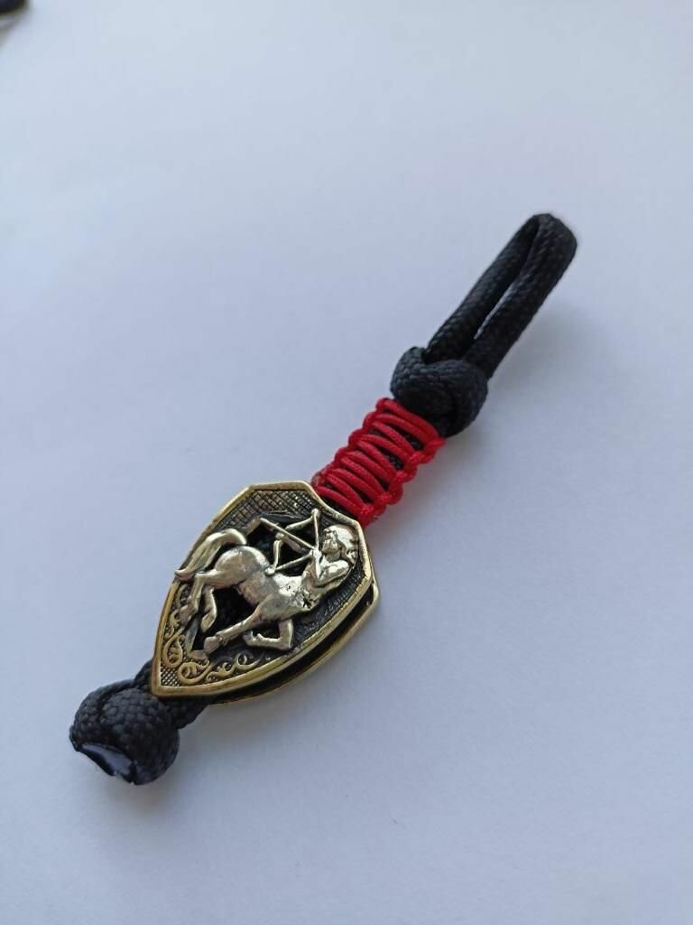 Темляк с бронзовой бусиной Стрелец