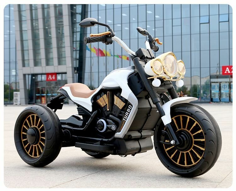 Детский трехколесный электромотоцикл, большая батарея 12V, ручка акселератора, автоматический запуск, ножной тормоз, кожаное сиденье, мягкие колеса из пеноматериала.