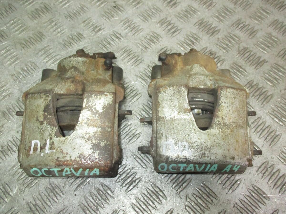 Суппорт тормозной передний Scoda Octavia A4