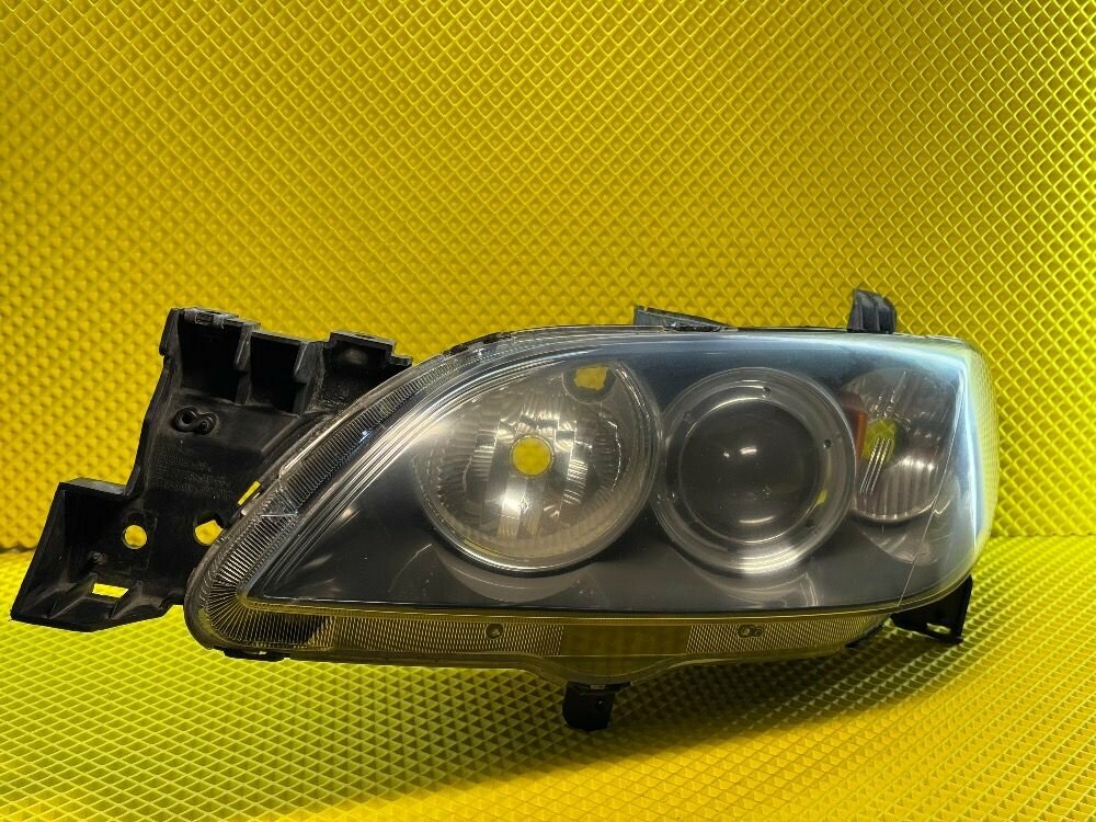 Фара левая ксенон Mazda 3 BK седан рестайлинг BP9R51041D